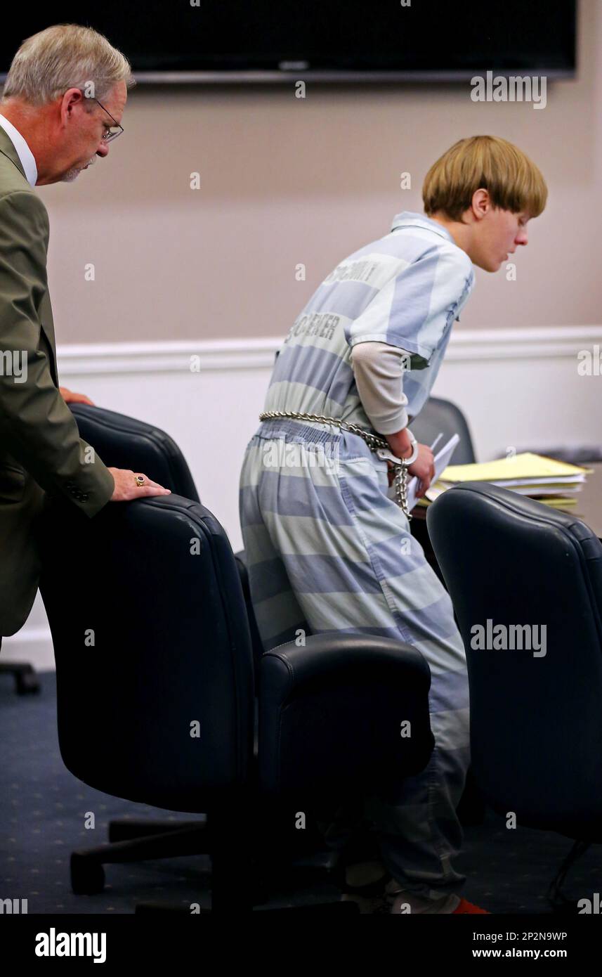 Dylann Roof sits down before a court hearing in Charleston, S.C., on ...