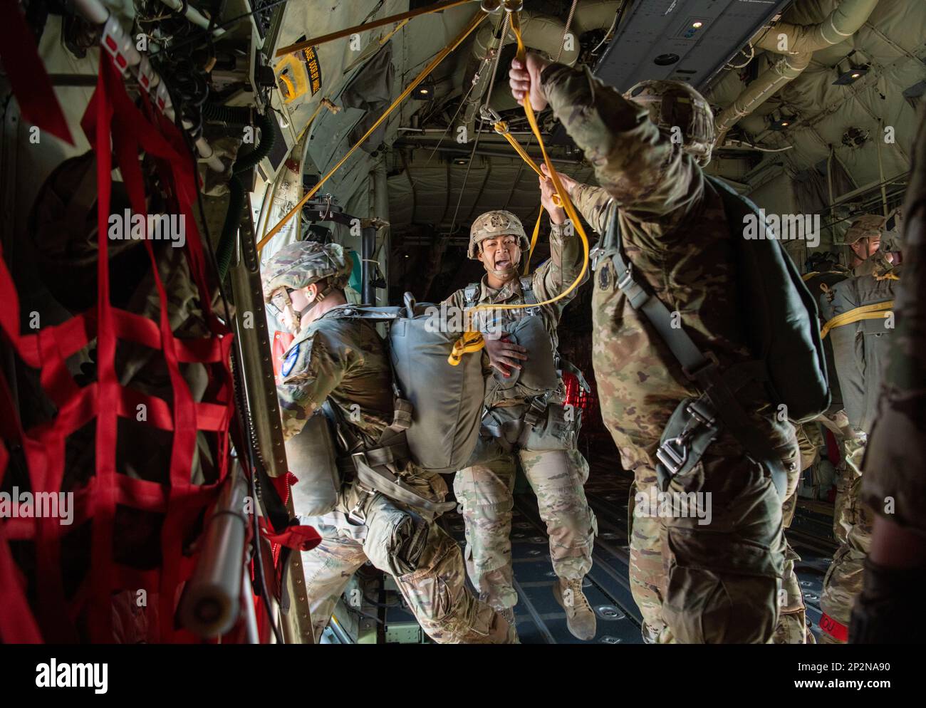 U.S. Army paratroopers from the 11th Airborne Division prepares to jump ...