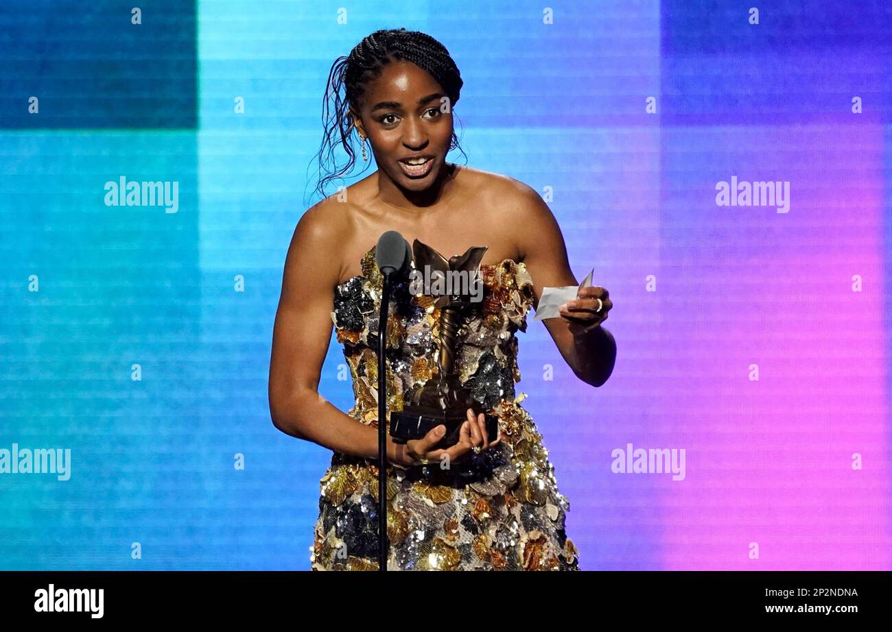 Ayo Edebiri accepts the award for for best supporting performance in a ...