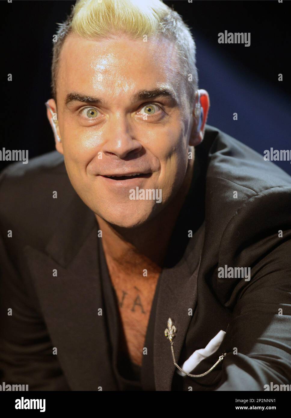 Singer Robbie Williams performs on stage during a concert to celebrate ...