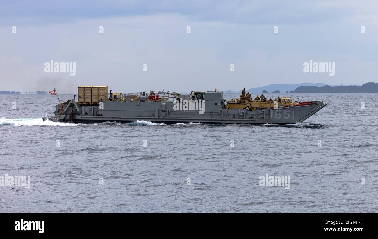 A U.S. Navy landing craft, utility vehicle deploys from the amphibious ...