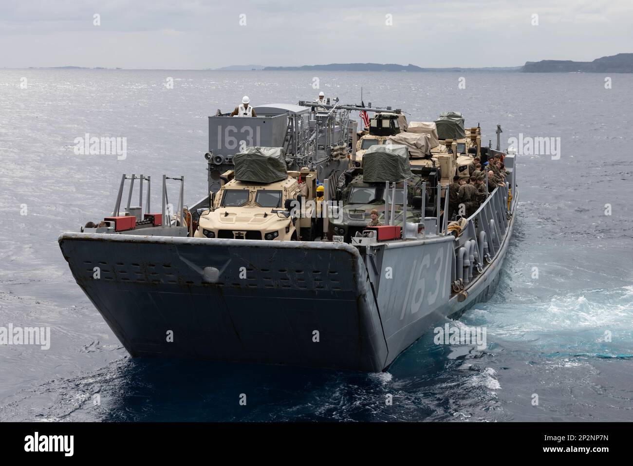 A U.S. Navy landing craft, utility deploys from the amphibious dock ...