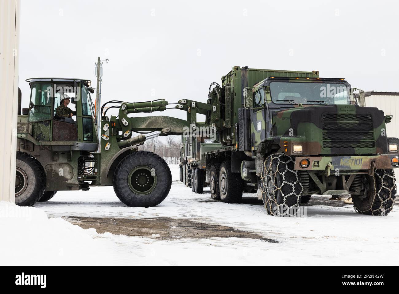 U.S. Marine Corps Lance Cpl. Trenton Tackett, an engineer equipment ...