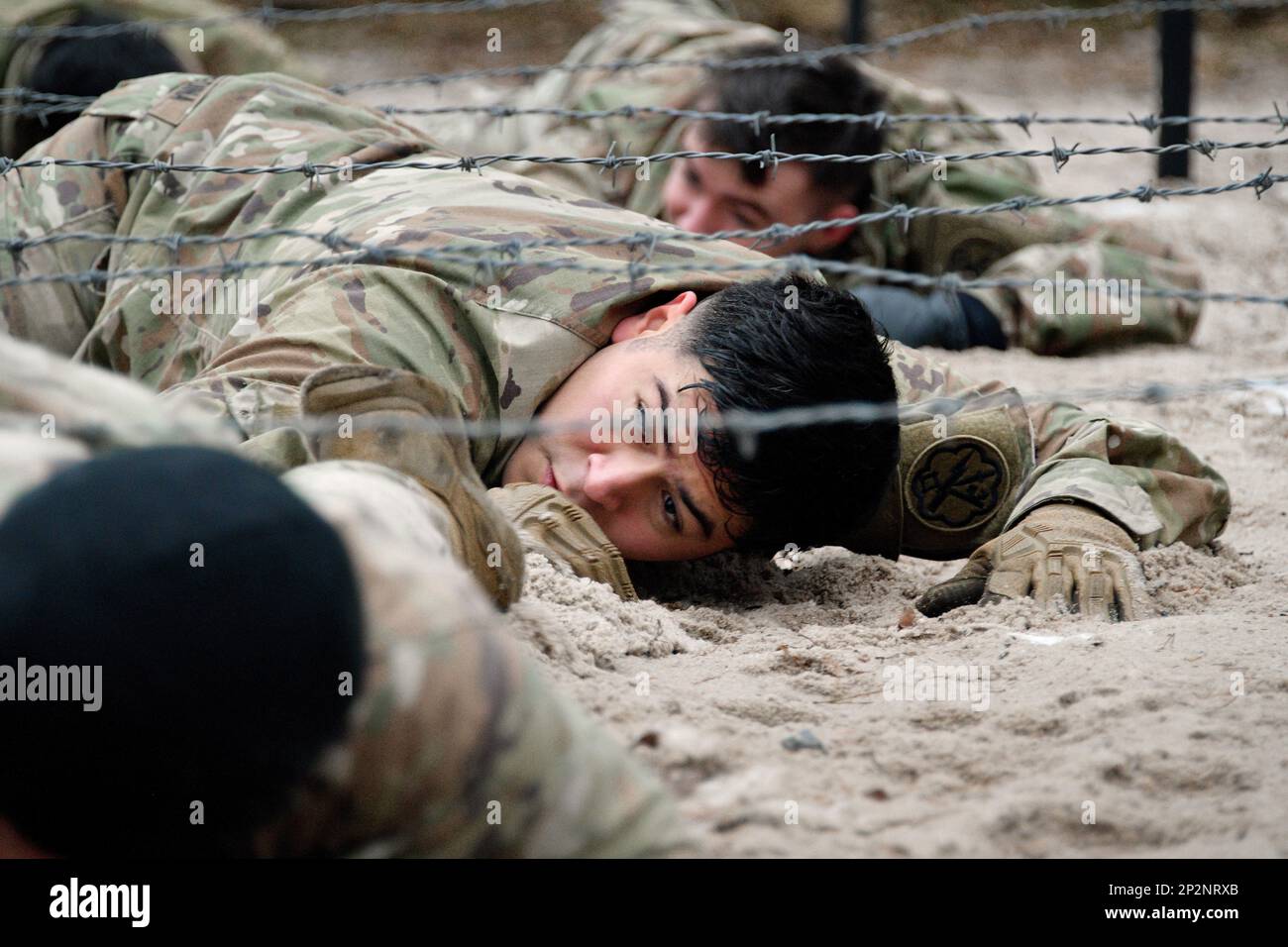 U.S. Soldiers with 207th Military Intelligence Brigade maneuver through ...
