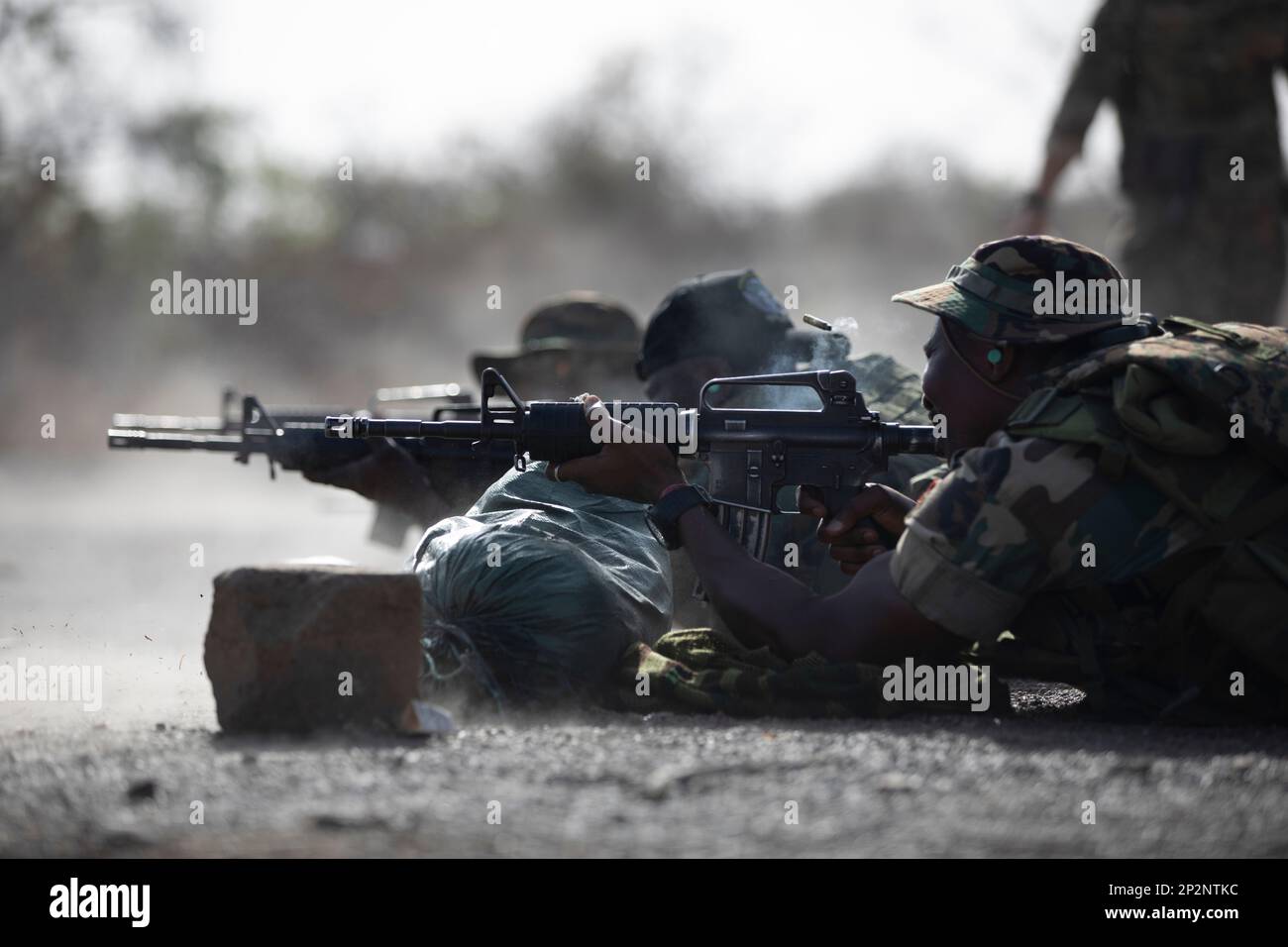 A Ghanian special forces soldier, fires a rifle at range training ...