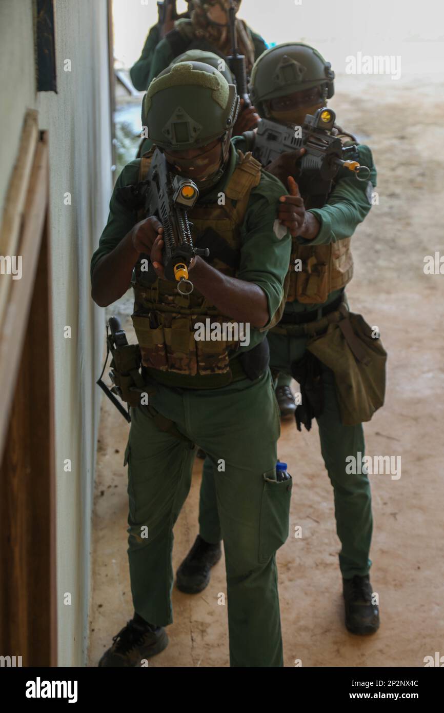 Ivorian Special Forces Soldiers prepare to breach a room at a simulated ...