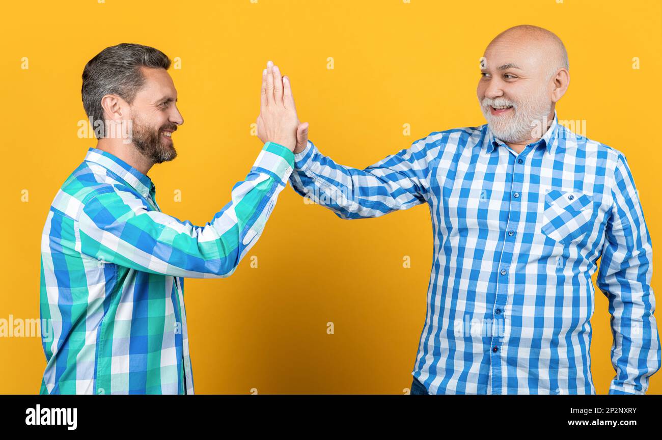 five of two generation friends on background. photo of two generation ...