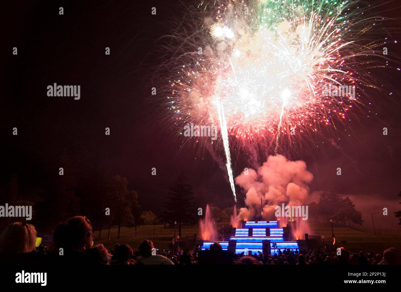 Fireworks burst above Cascade Falls during a Fourth of July fireworks ...