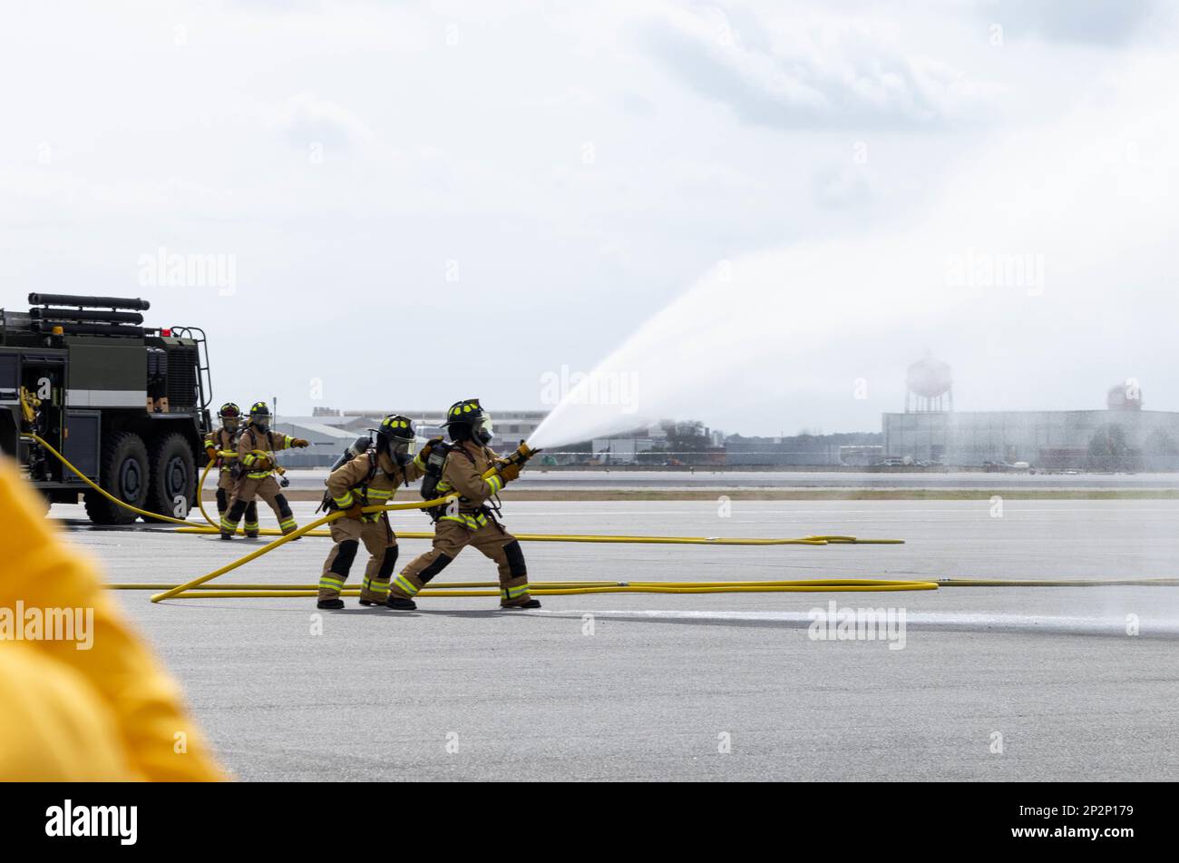 U.S. Marines with Aircraft, Rescue and Firefighting provide a ...