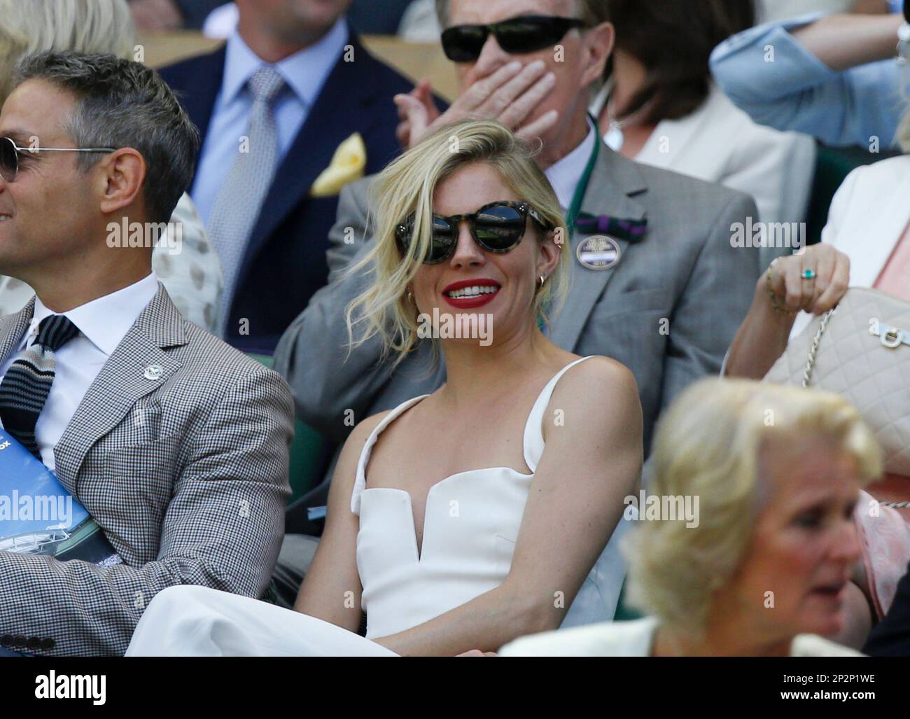 British actress Sienna Miller smiles as she sits in the Royal Box of ...