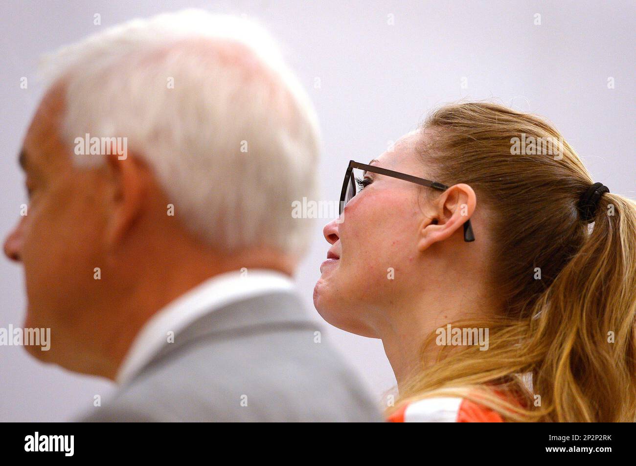 Brianne Altice cries as her attorney Ed Brass speaks during her ...