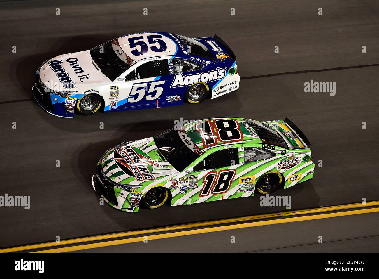 David Ragan (55) races with Kyle Busch, Interstate Batteries Toyota ...