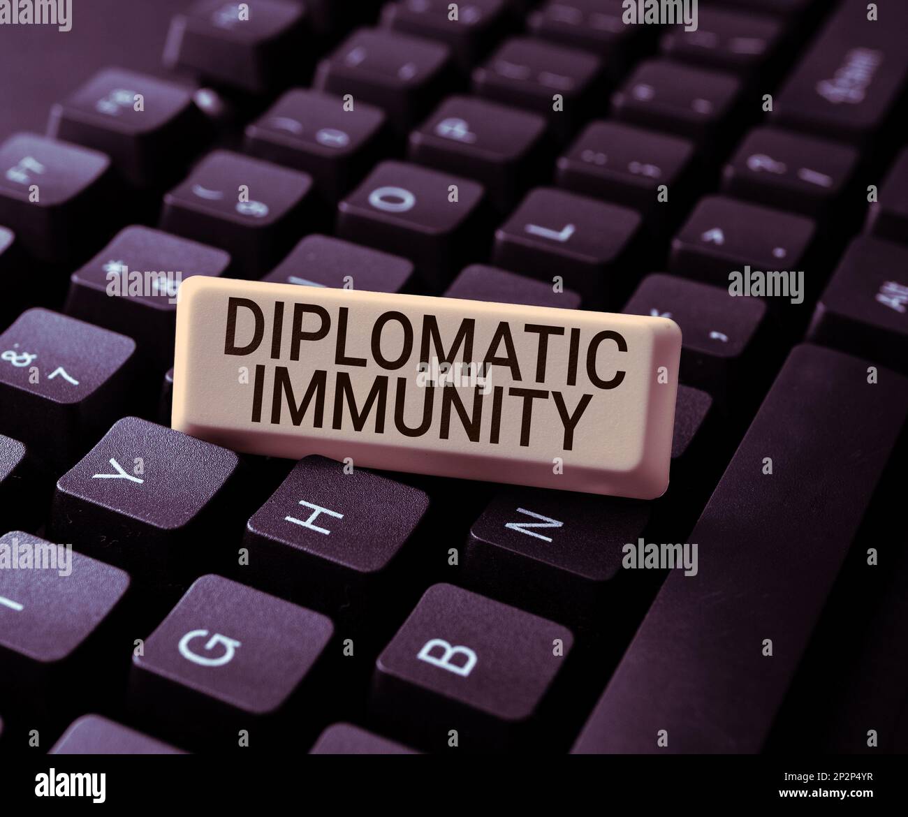 Hand writing sign Diplomatic Immunity. Concept meaning law that gives ...