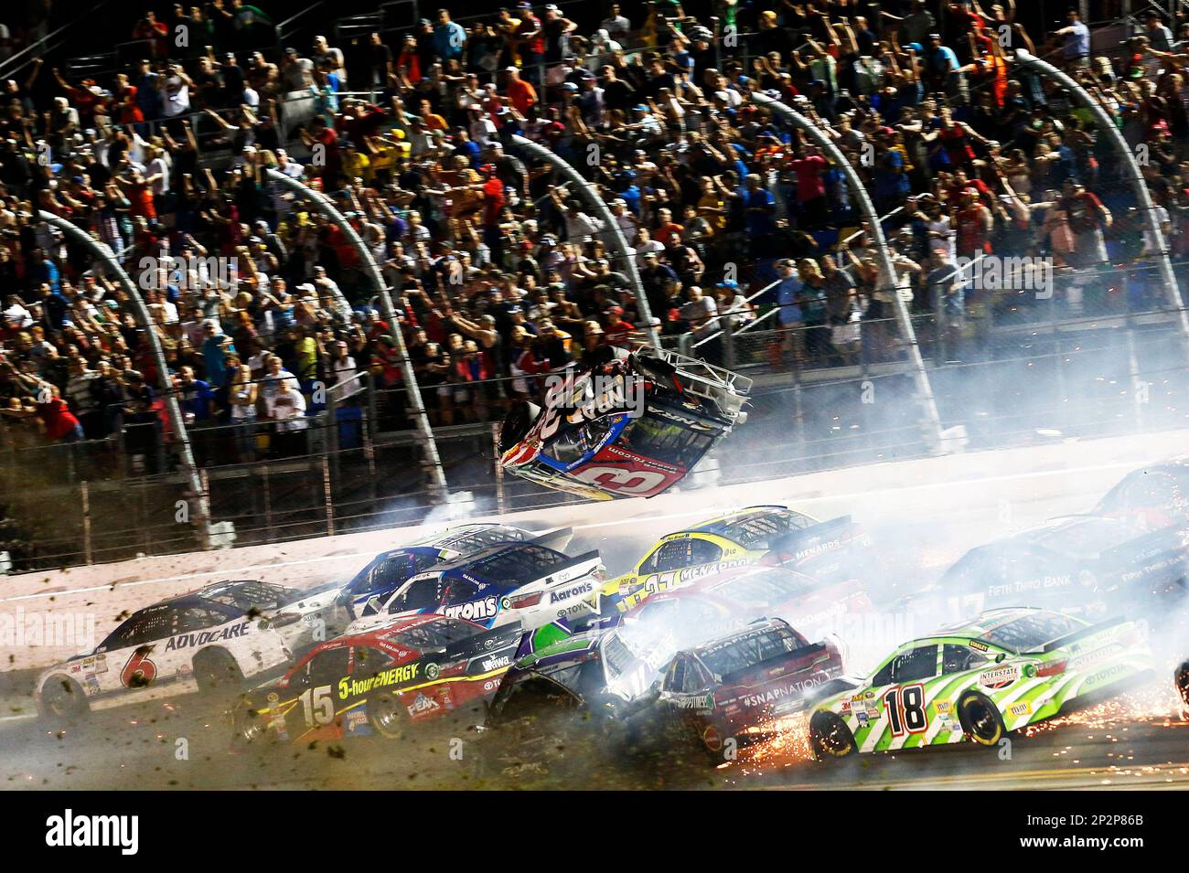 Austin Dillon crashes into the catch fence during the NASCAR Coke Zero ...