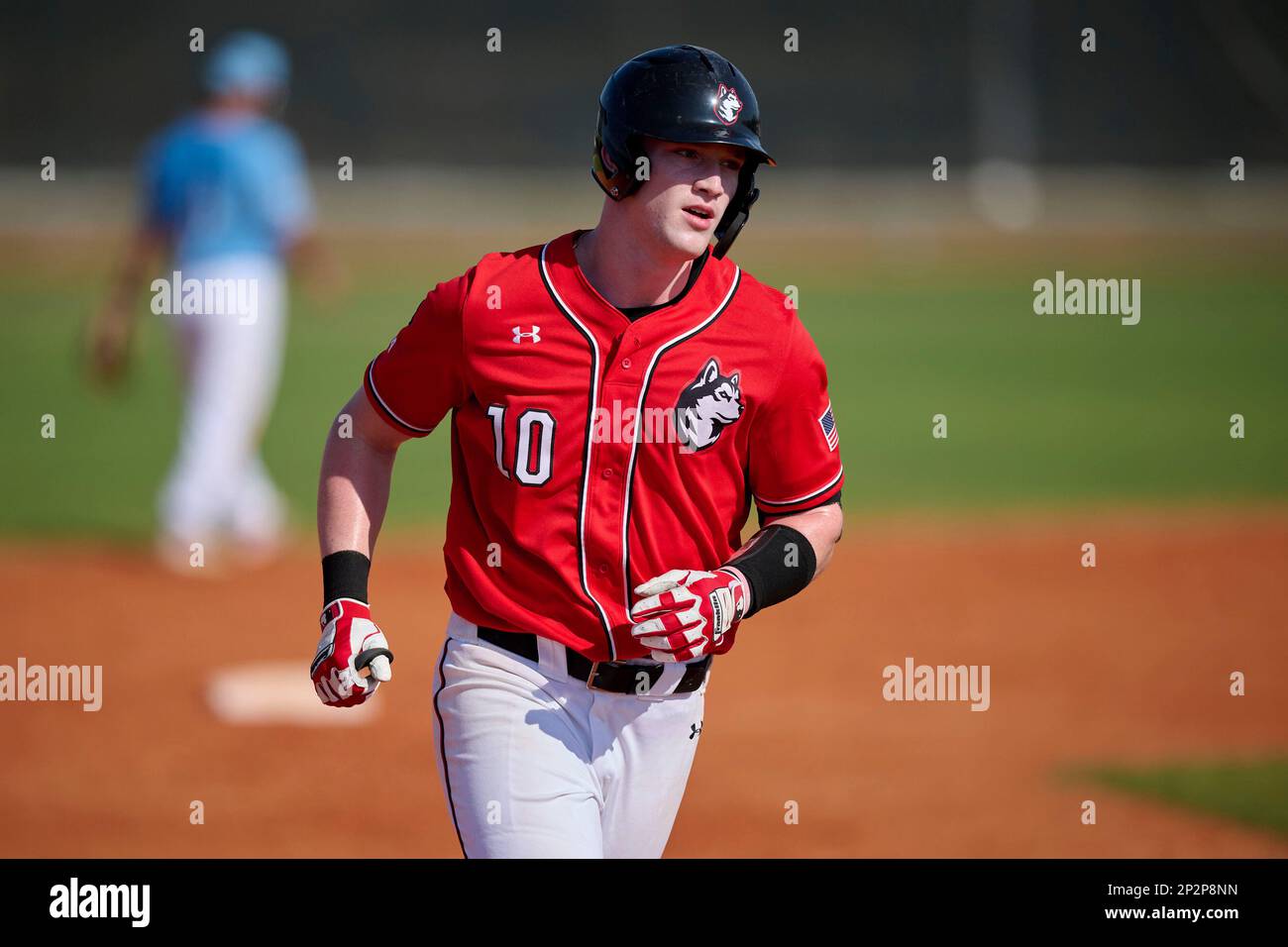 Northeastern Huskies Alex Lane (10) rounds the bases after hitting a ...