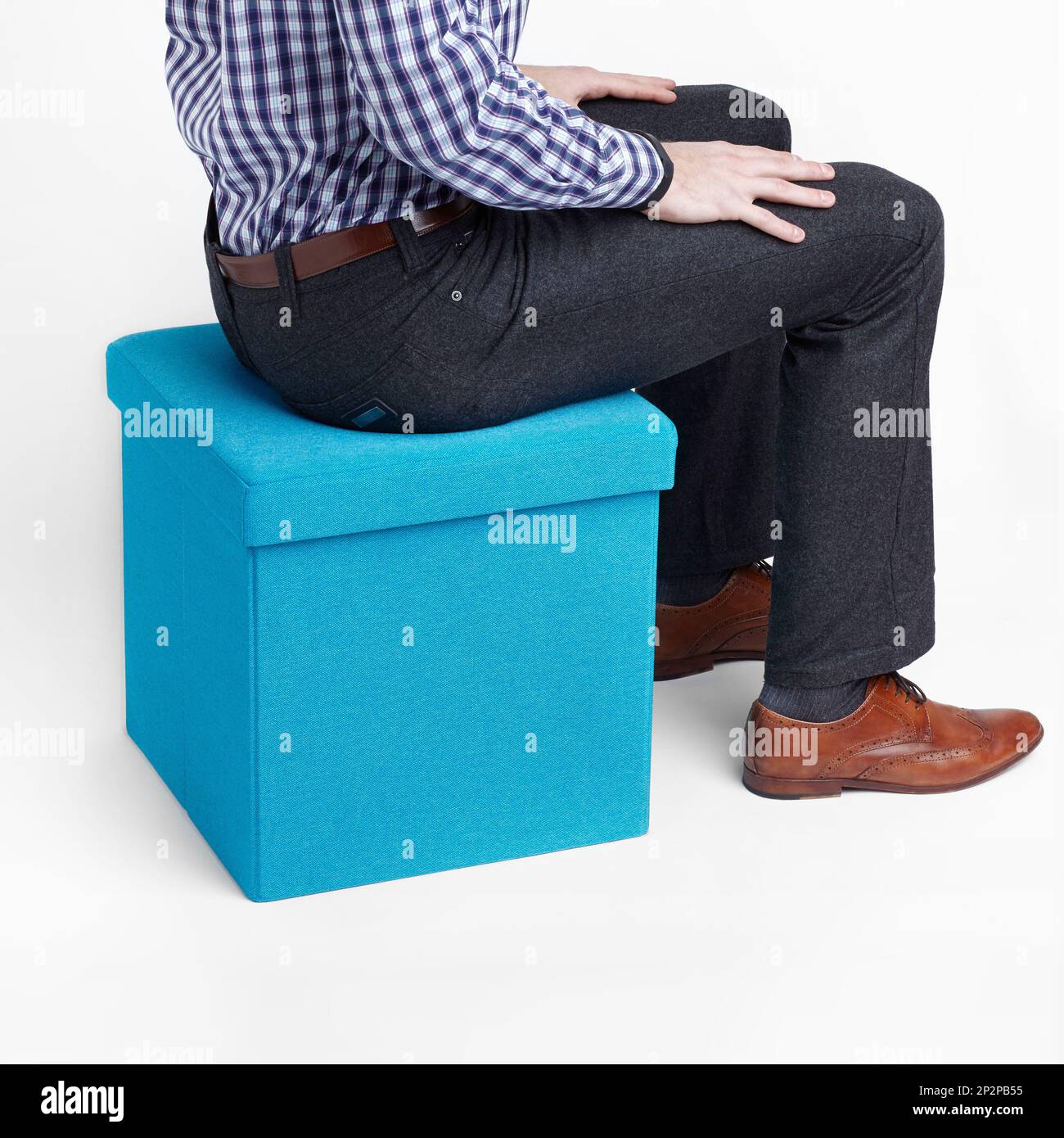 This photo provided by Poppin shows a storage unit called the Box Seat ...