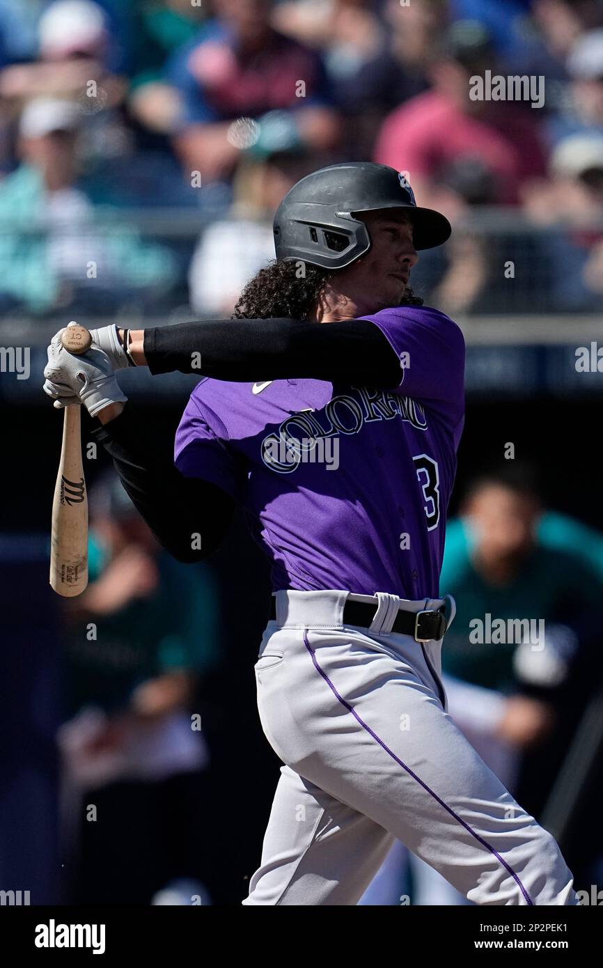 Colorado Rockies' Cole Tucker swings at a pitch during the first inning ...