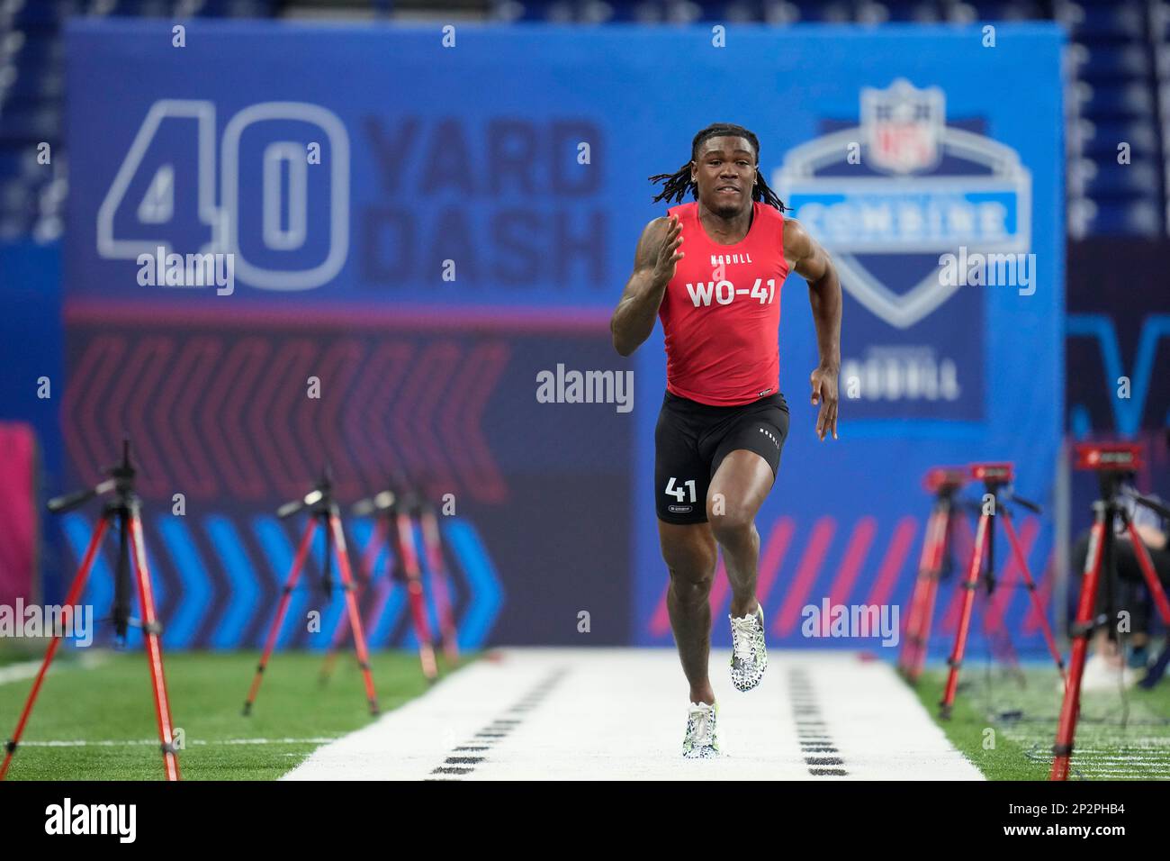 SMU wide receiver Rashee Rice runs a drill at the NFL football scouting ...