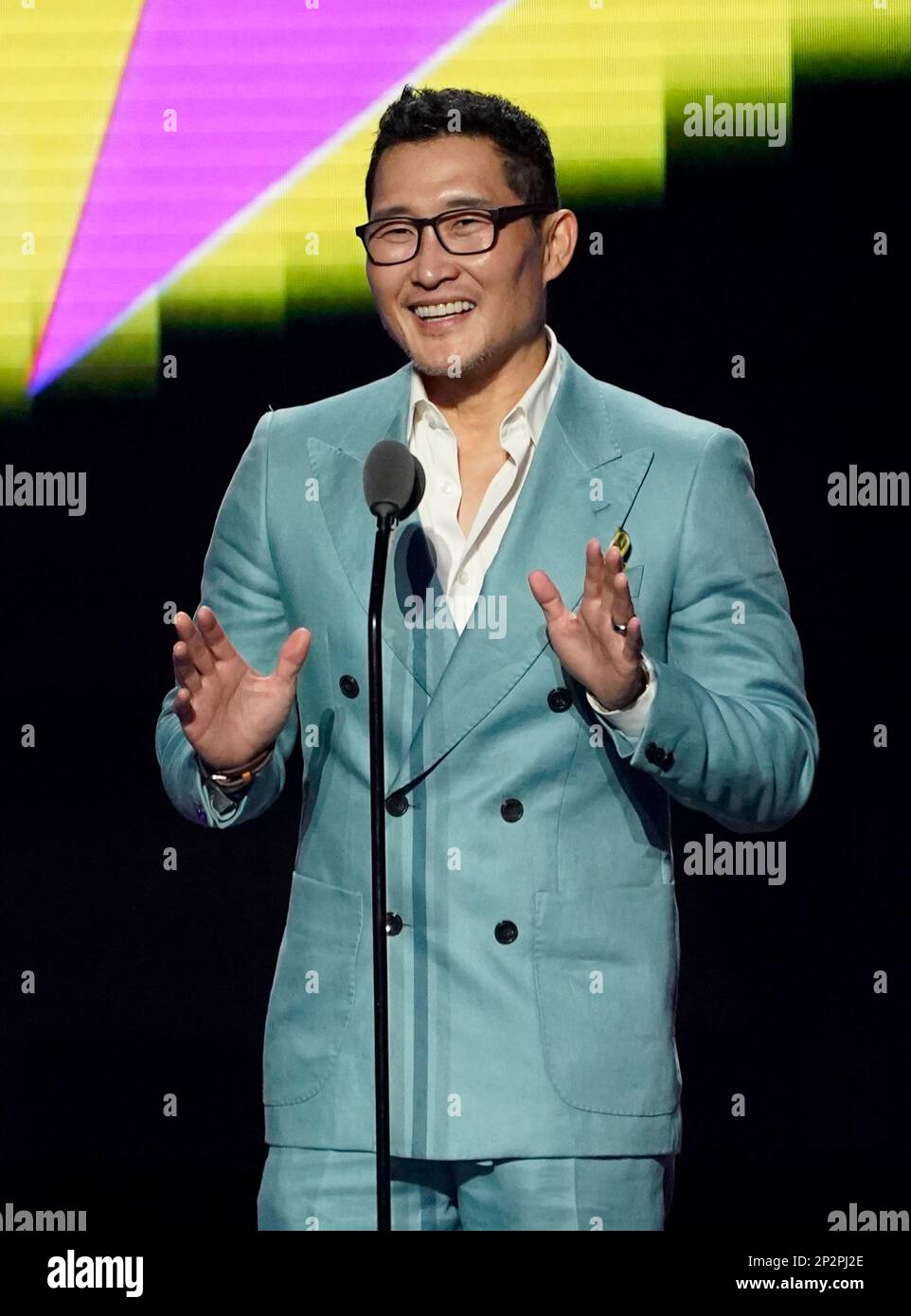 Daniel Dae Kim presents the award for best ensemble cast in a new ...