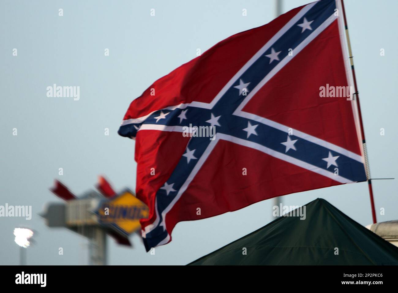 A Confederate flag flies in the infield during the 57th Annual NASCAR ...
