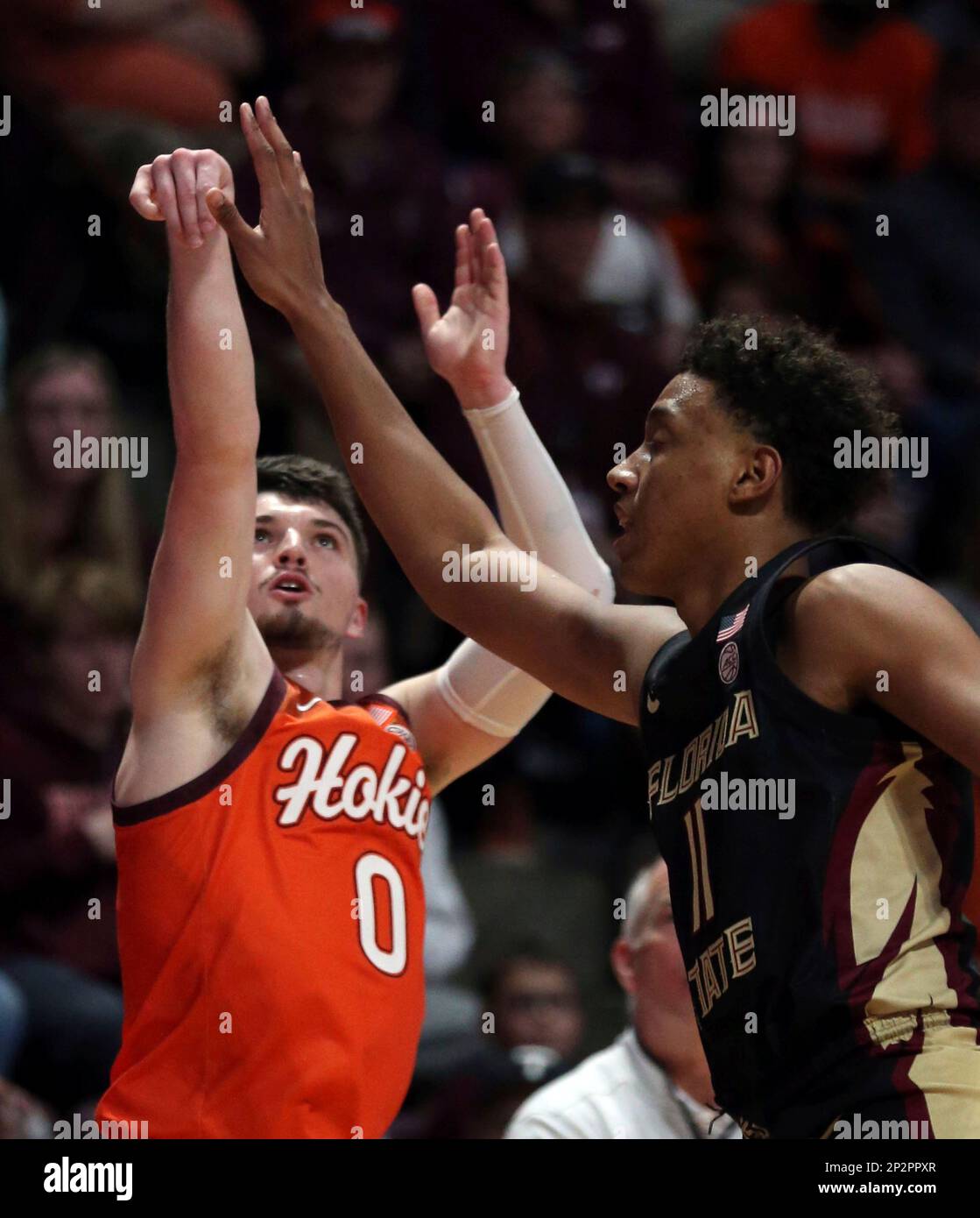 Virginia Tech's Hunter Cattoor (0) shoots 3-point basket during the ...