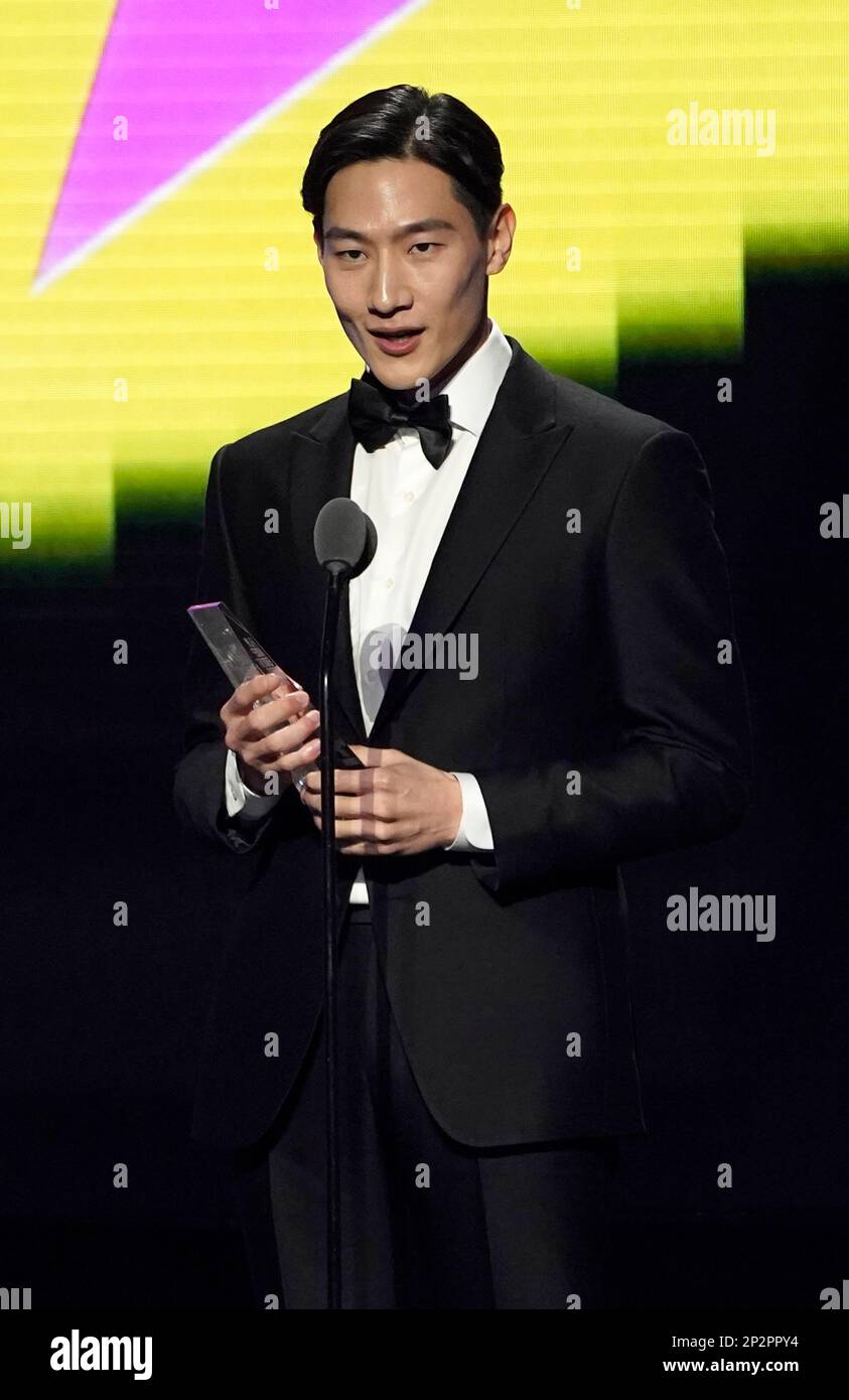 Steve Sanghyun Noh accepts the award for best ensemble cast in a new ...