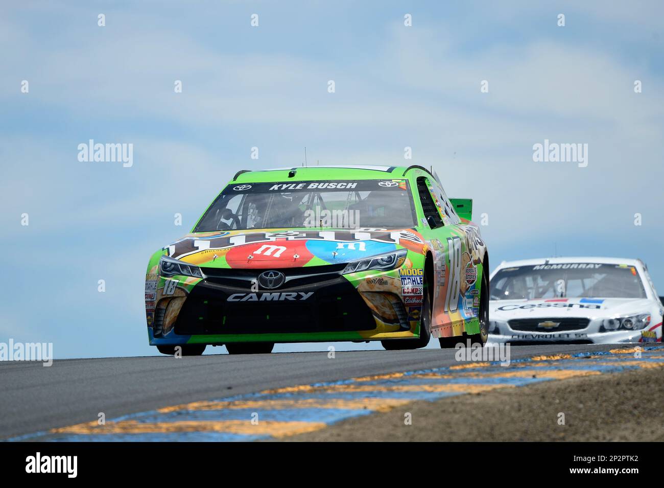 Kyle Busch, M&M's Crispy Toyota Camry (18) races with Jamie McMurray (1 ...