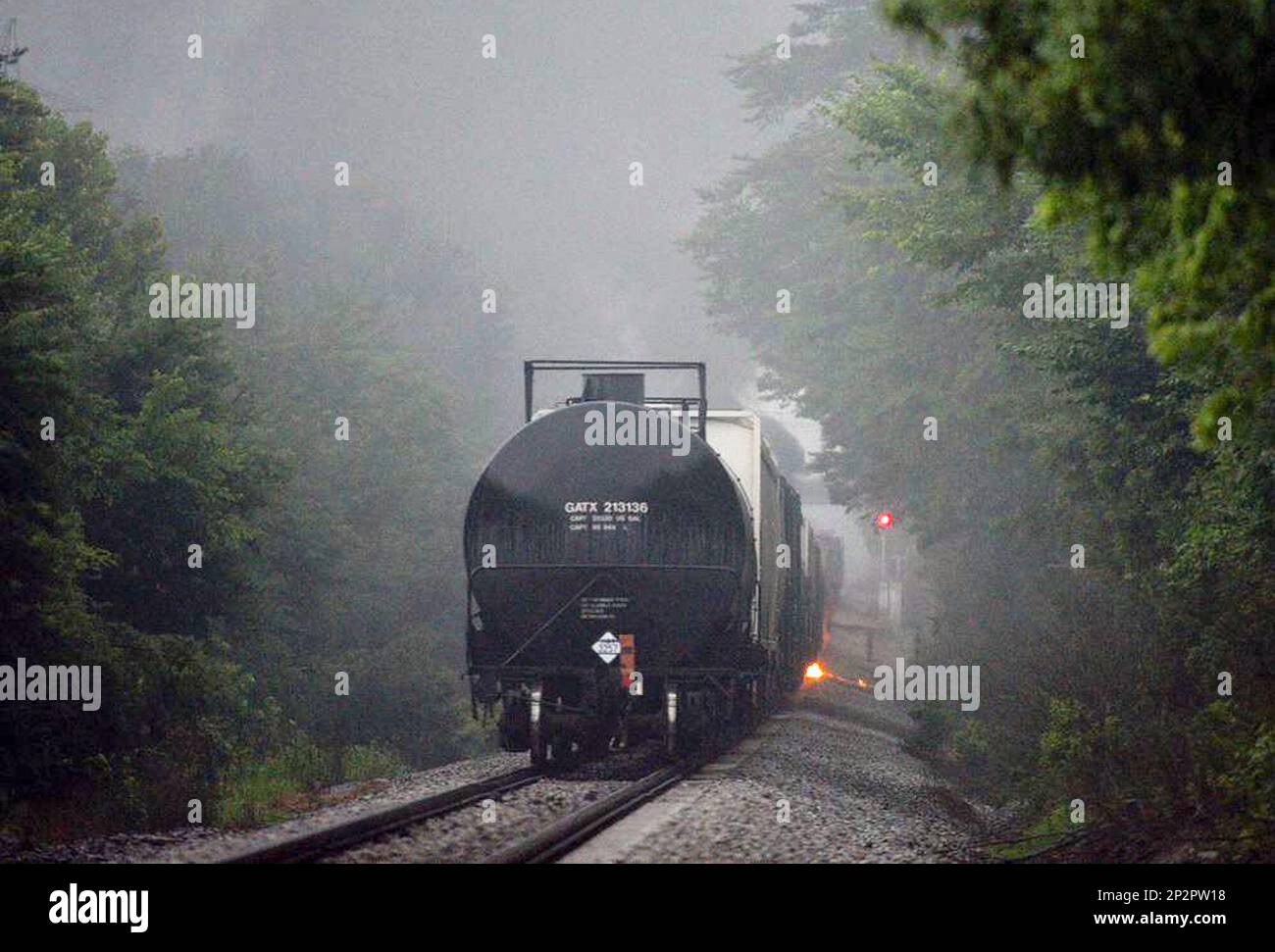 Flames are shown coming from a CSX train carrying flammable and toxic ...