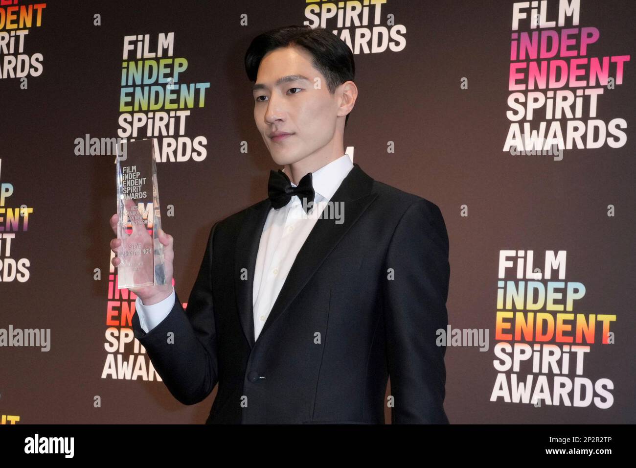Steve Sanghyun Noh poses in the press room with the award for best ...