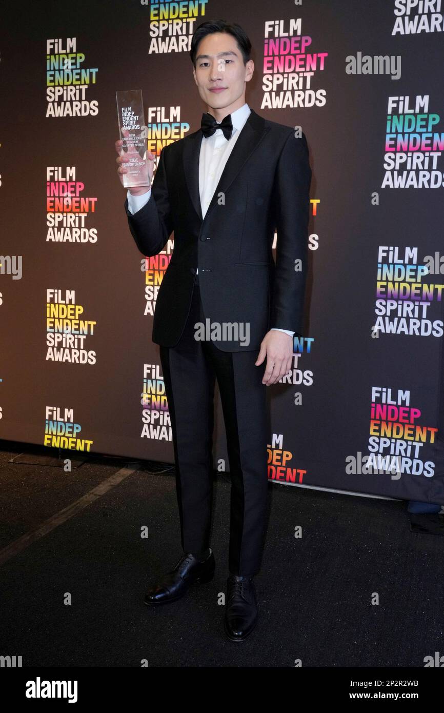 Steve Sanghyun Noh poses in the press room with the award for best ...