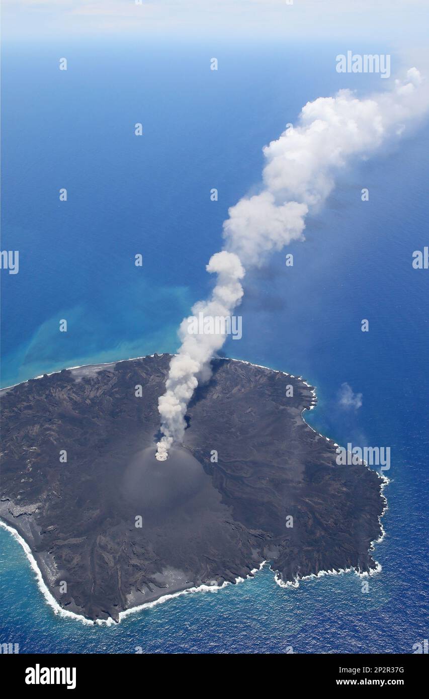 An aerial photo shows Nishinoshima Island still smoldering and sending ...