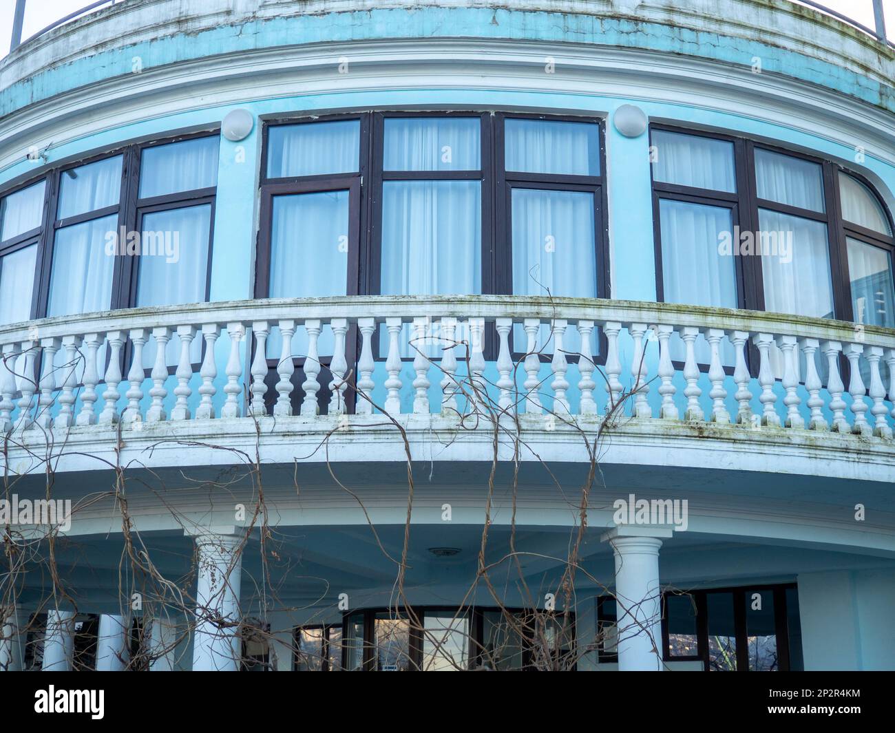 Balcony in a semicircle. Building's facade. beautiful blue building ...
