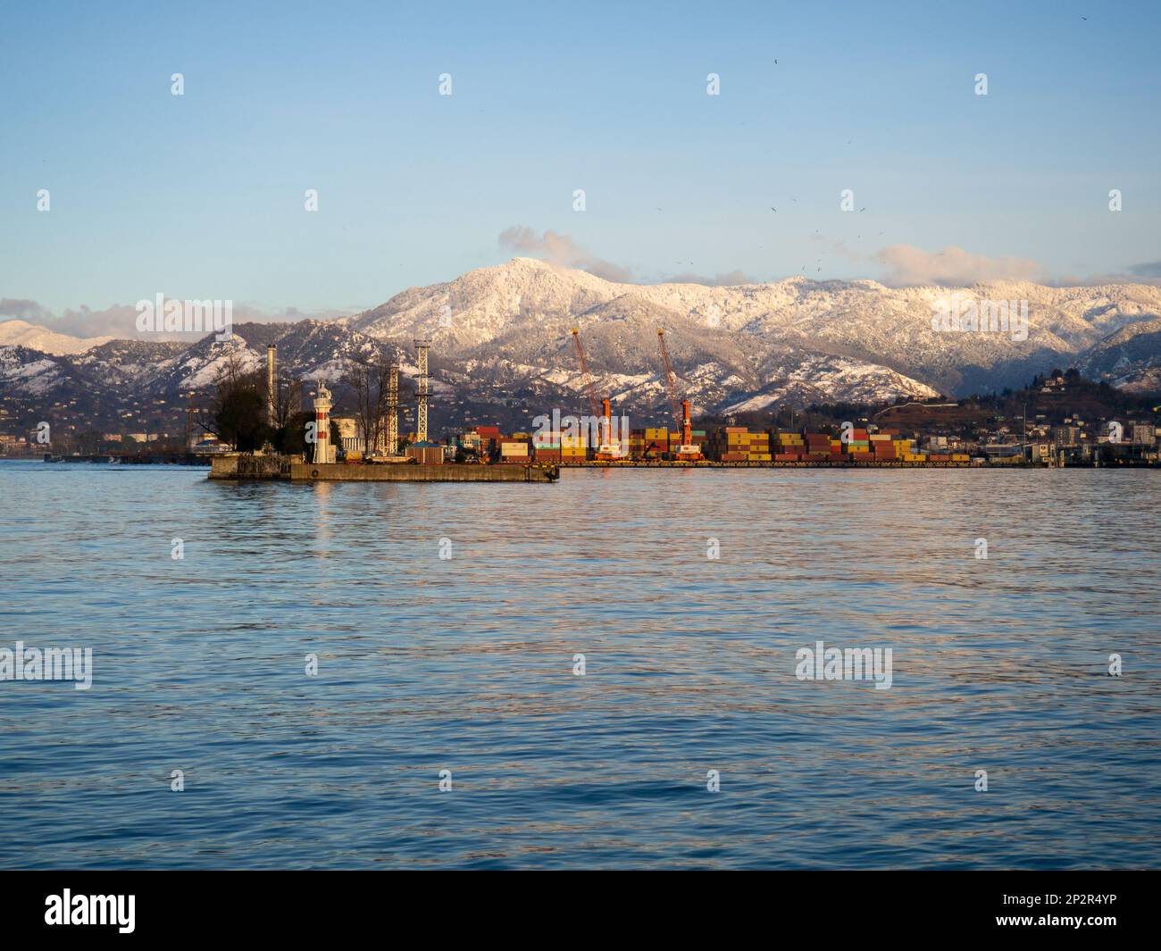 seaport and mountains are visible. Nature and technology. Batumi city ...