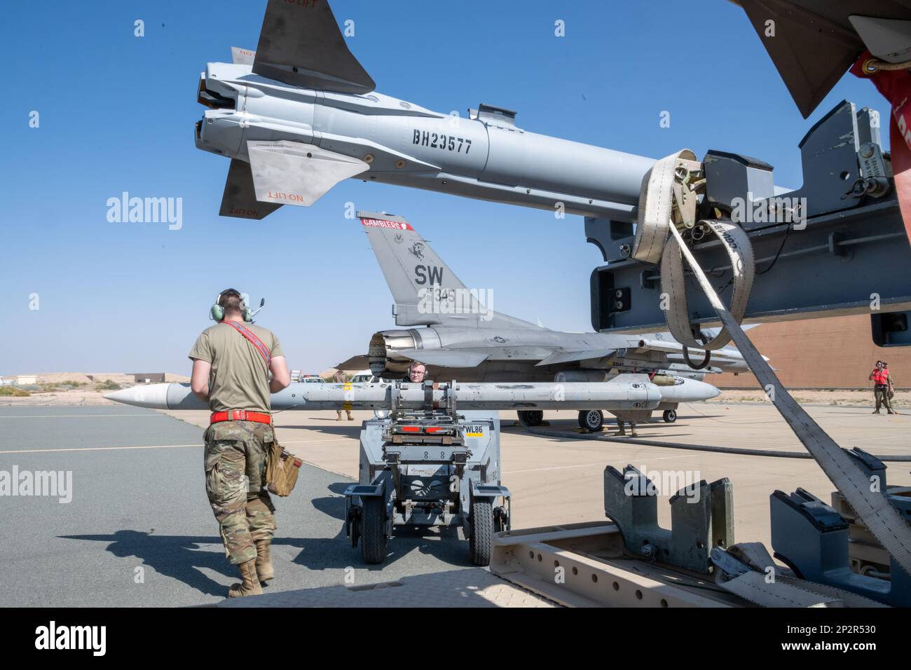 U.S. Air Force Staff Sgt. Gage Rothlingshofer and Airman 1st Class ...