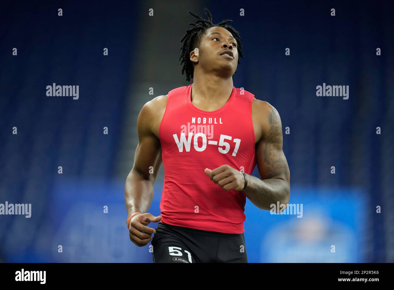 Virginia wide receiver Dontayvion Wicks runs a drill at the NFL ...
