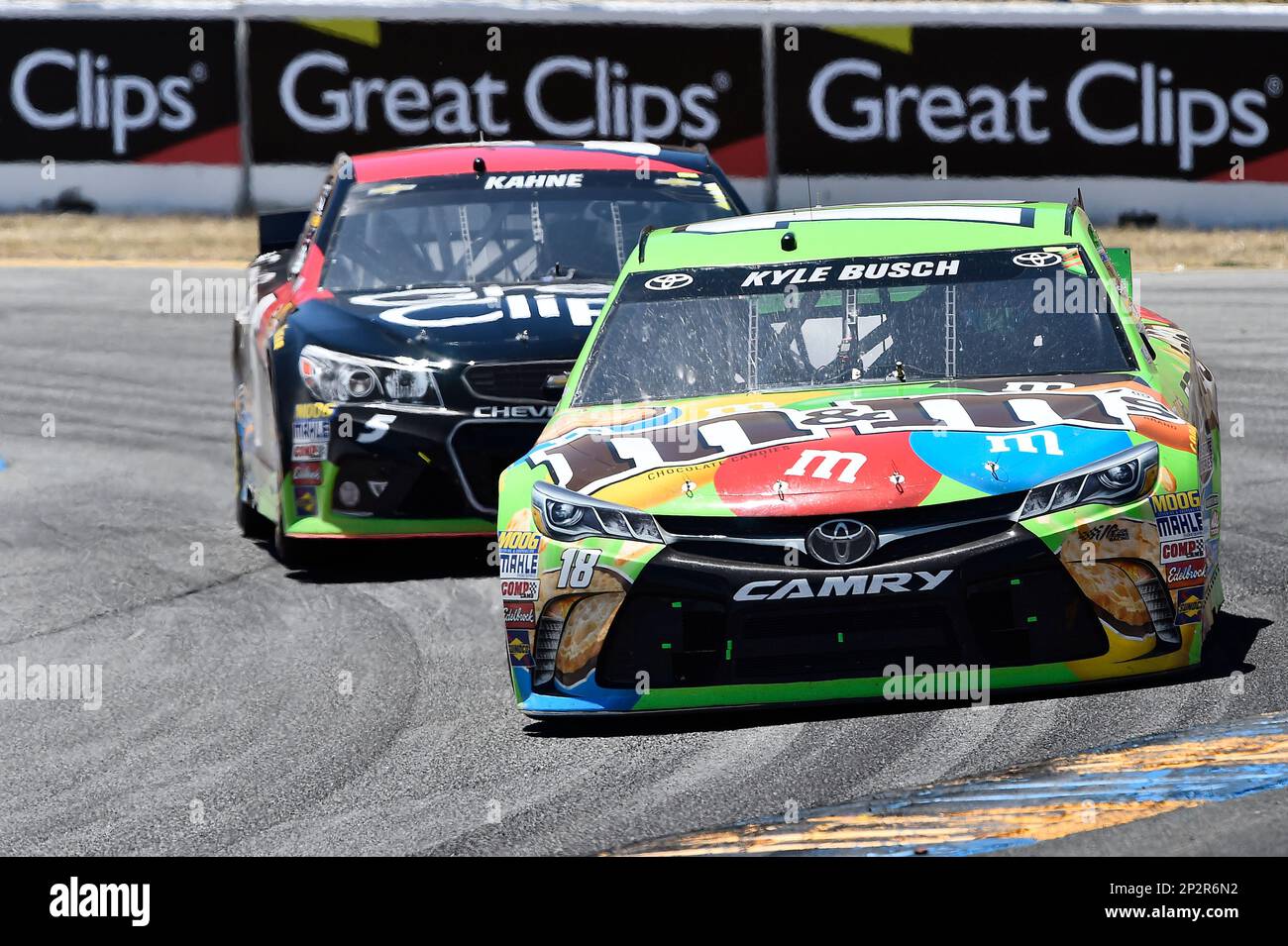 Kyle Busch, M&M's Crispy Toyota Camry (18) races with Kasey Kahne (5 ...