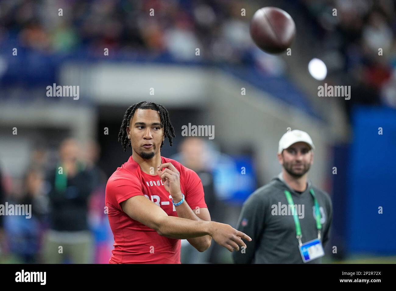 Ohio State quarterback CJ Stroud runs a drill at the NFL football scouting combine in ...