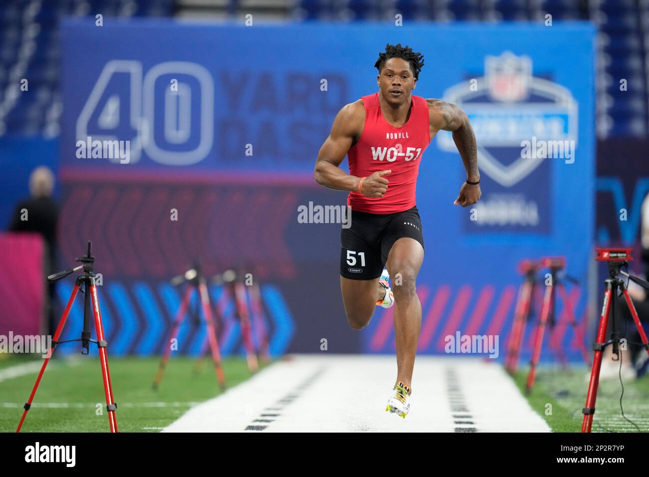 Virginia wide receiver Dontayvion Wicks runs a drill at the NFL ...