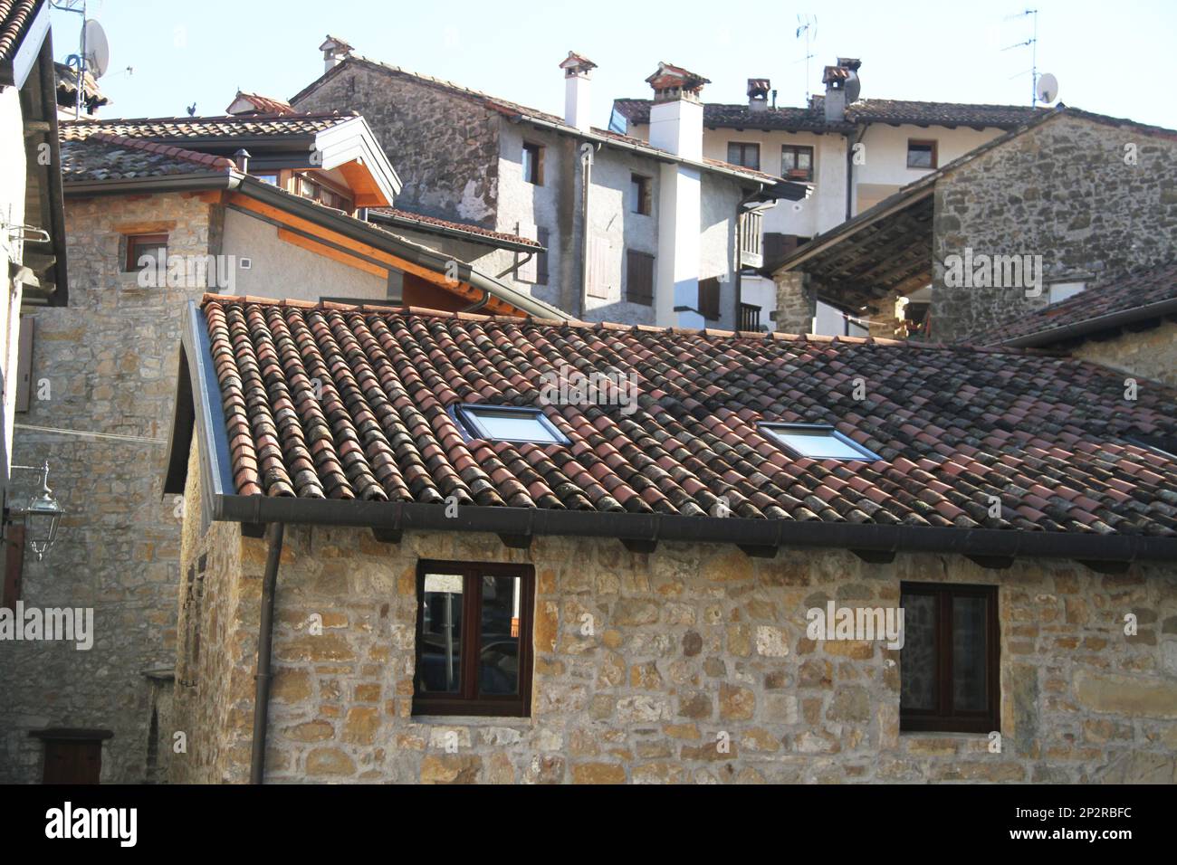 View of the typical stone residential buildings in Frisanco, Italy ...