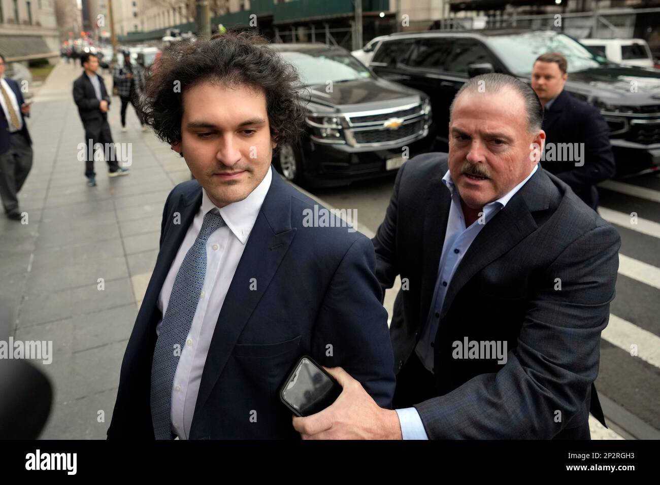 FILE - FTX founder Sam Bankman-Fried, left, arrives at Manhattan ...