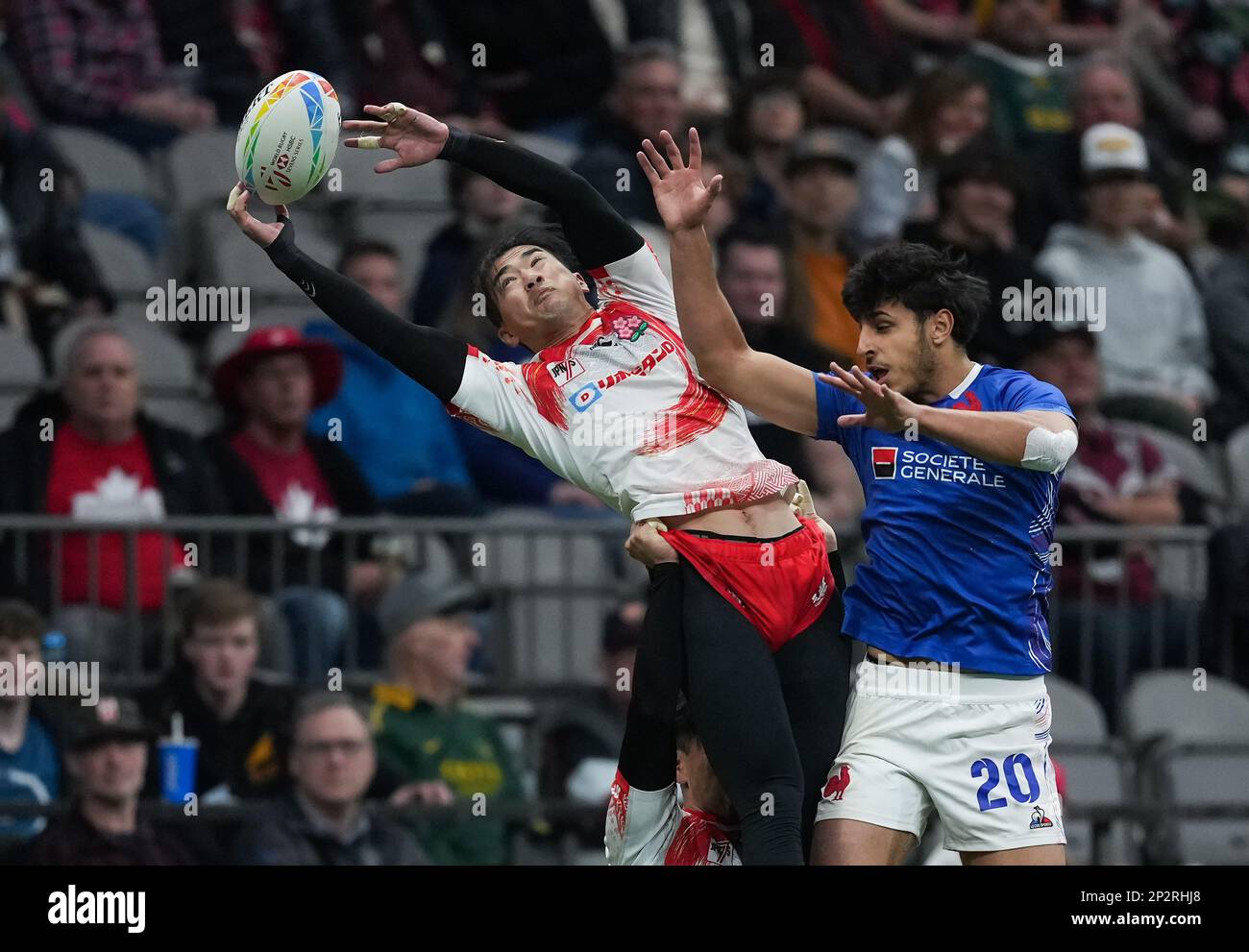 Japan's Taiga Ishida, left, and France's Theo Forner vie for the ball ...