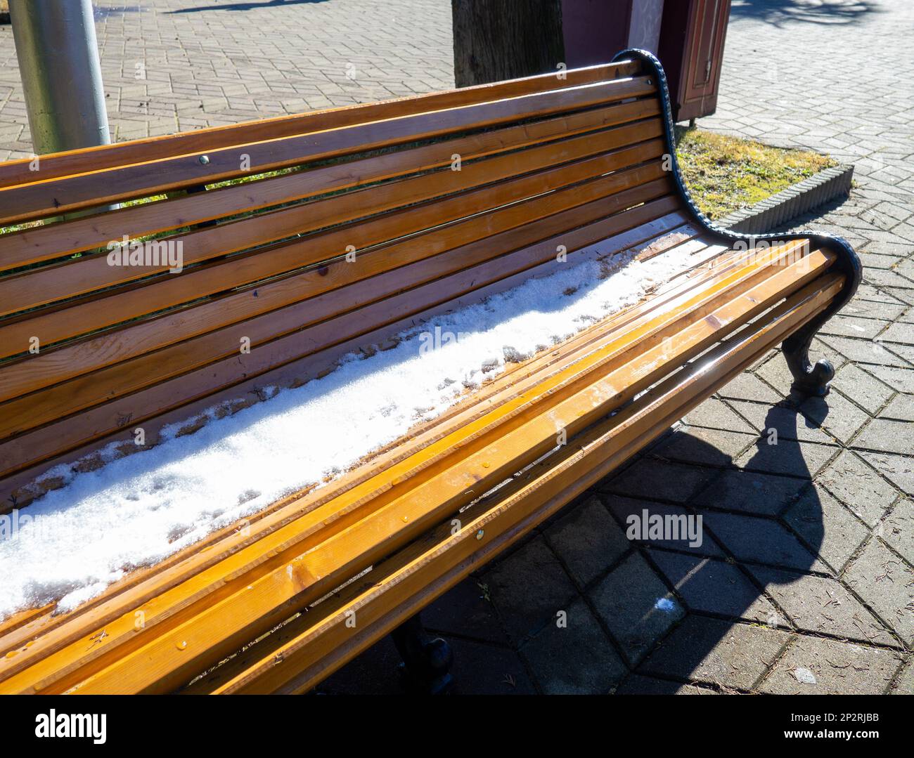 Snow on a park bench. Winter in Batumi. Winter at the resort. Southern ...