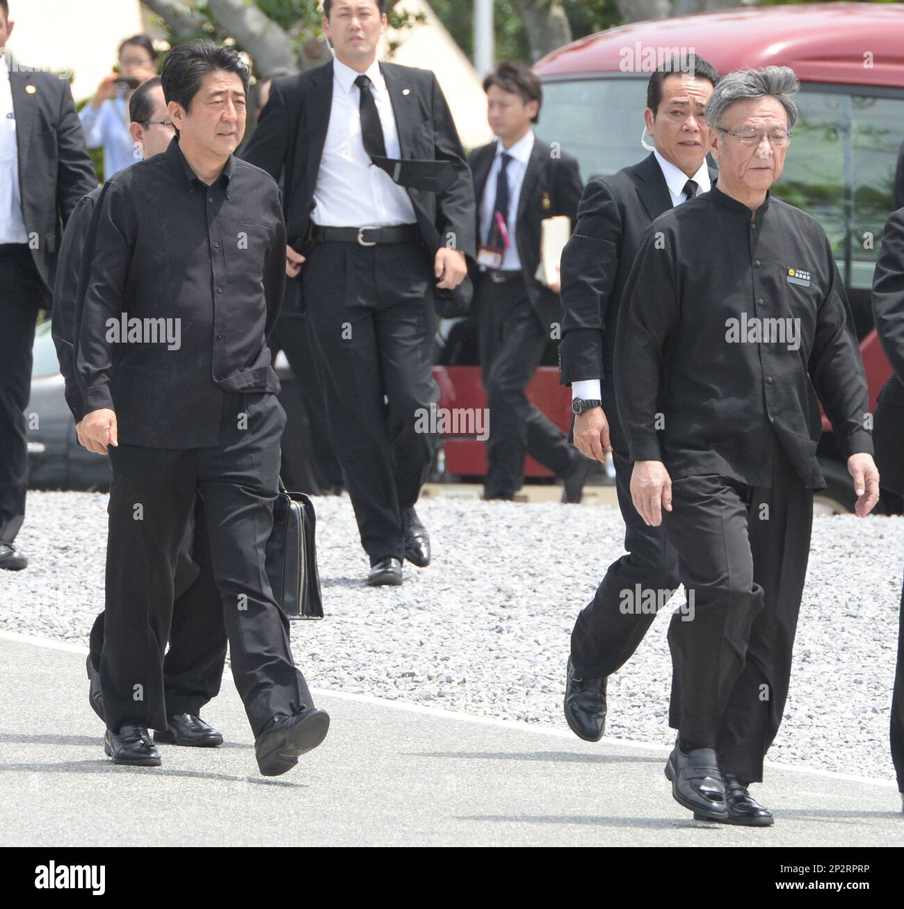 Prime Minister Shinzo Abe ( L) visits the National War Dead Peace ...