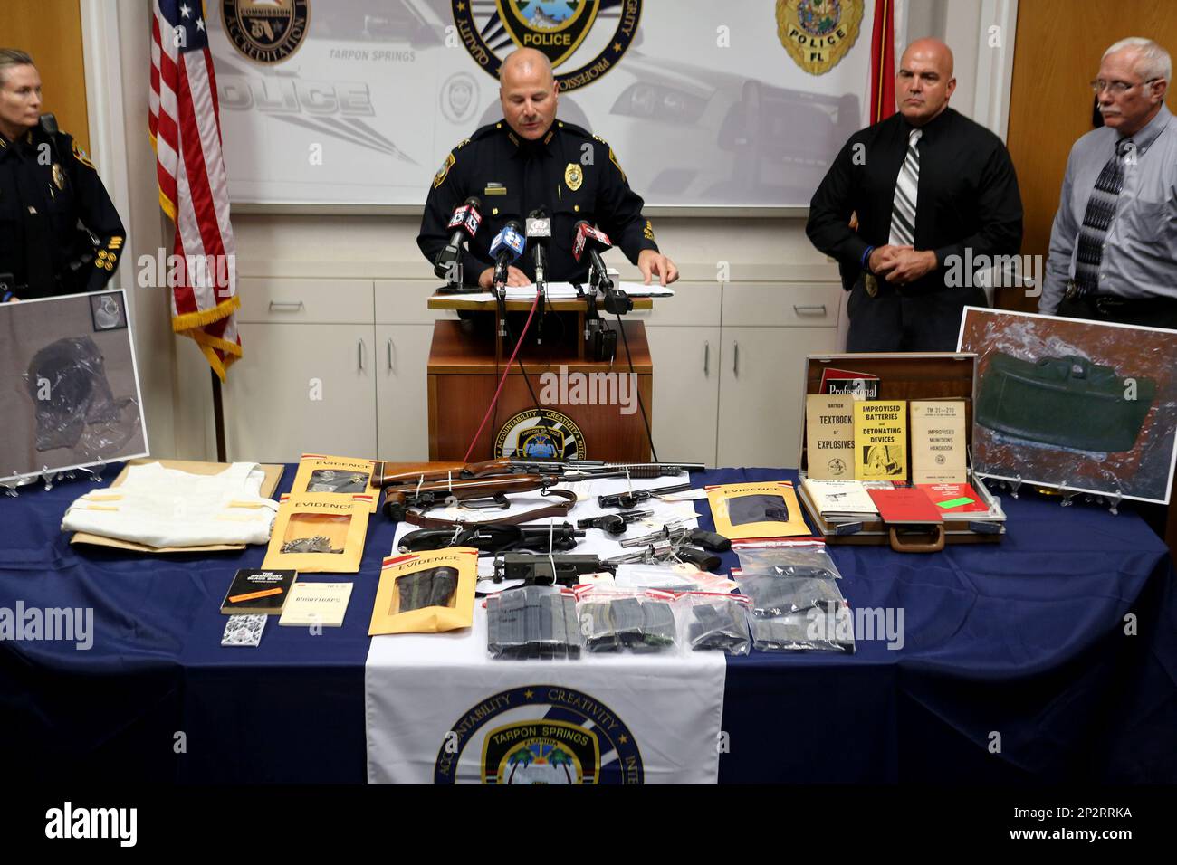 Tarpon Springs Police Chief Robert Kochen, center, flanked by Major ...