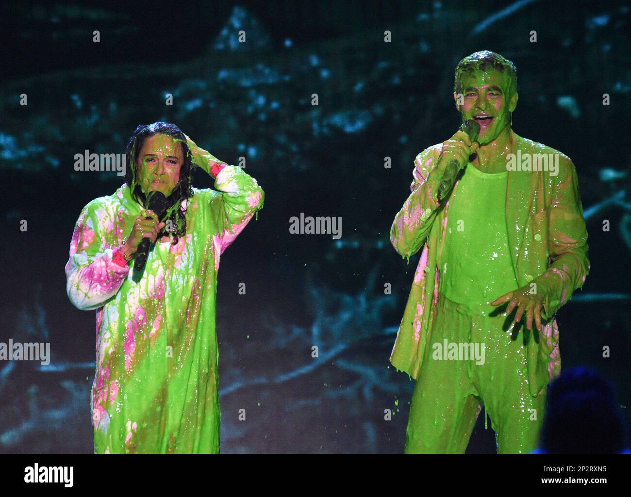 Michelle Rodriguez, left, and Chris Pine are slimed at the Nickelodeon ...