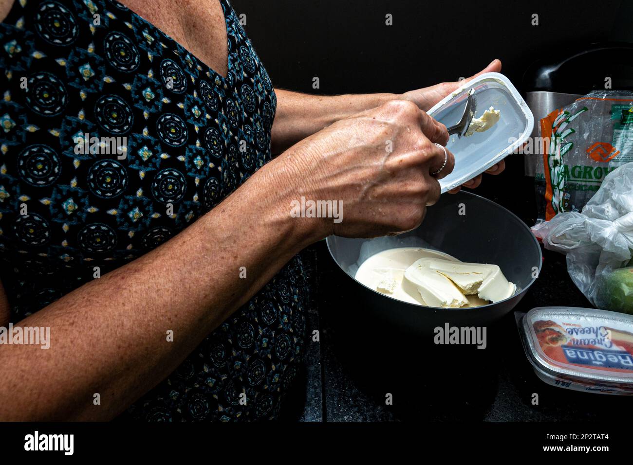 Woman frying pan butter hi-res stock photography and images - Alamy