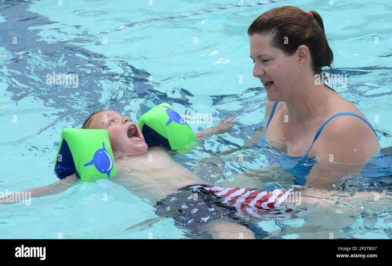 Amy McGeehin of Drums, Pa. teaches her son Daniel McGeehin, 3, how to ...