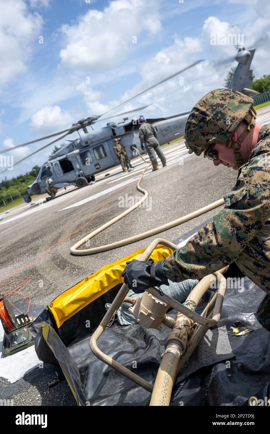 NAVAL BASE GUAM, Santa Rita, Guam (Feb. 14, 2023) Navy Cargo Handling ...