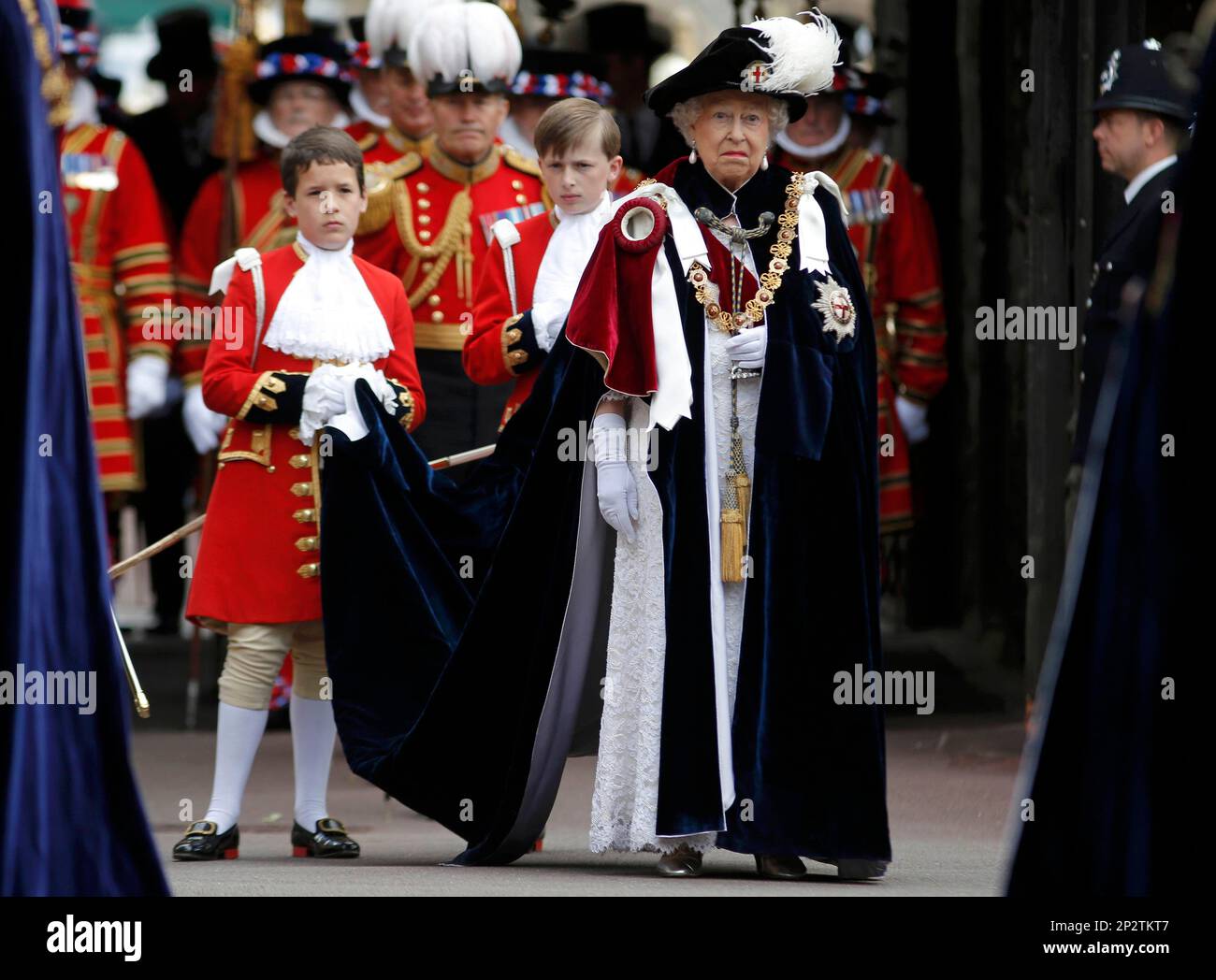 Britain's Queen Elizabeth II walks in procession as she attends the ...