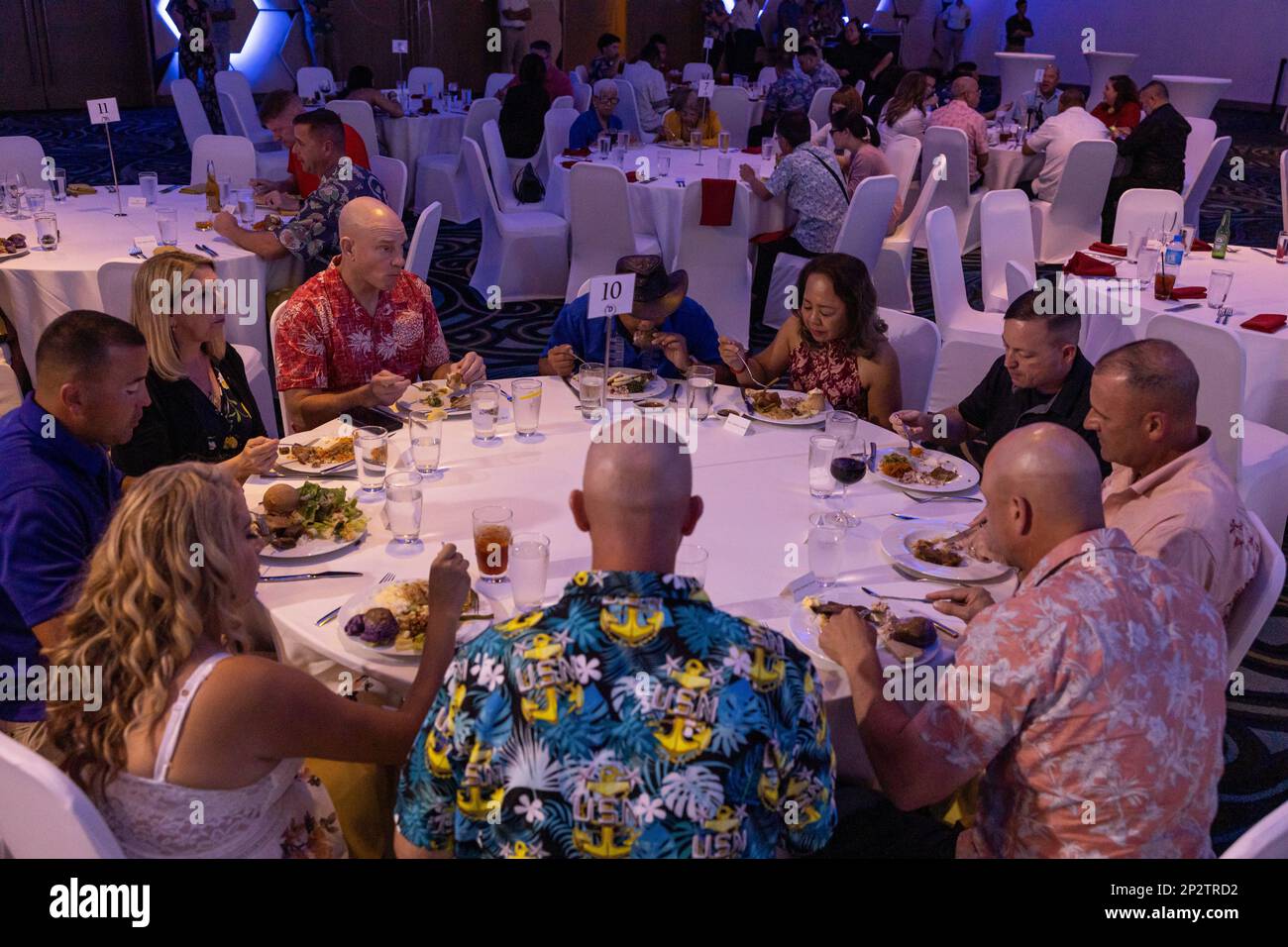 Attendees share a meal during the recognition of the Blaz grandsons at ...